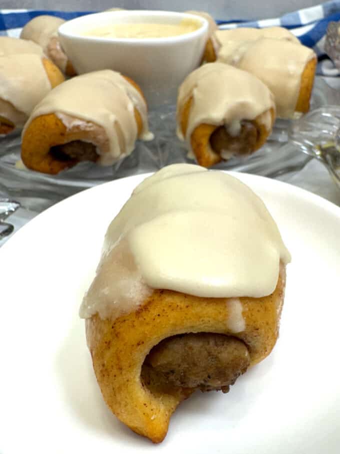 Cinnamon Roll Pigs in a Blanket with Maple Glaze - Pudge Factor