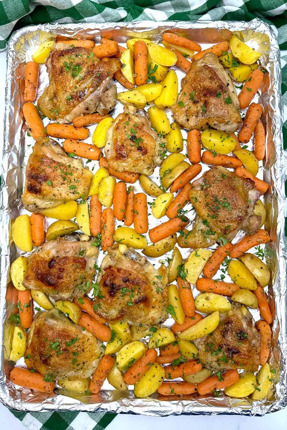 Simple Sheet Pan Ranch Chicken Thighs with Potatoes and Carrots - Pudge ...