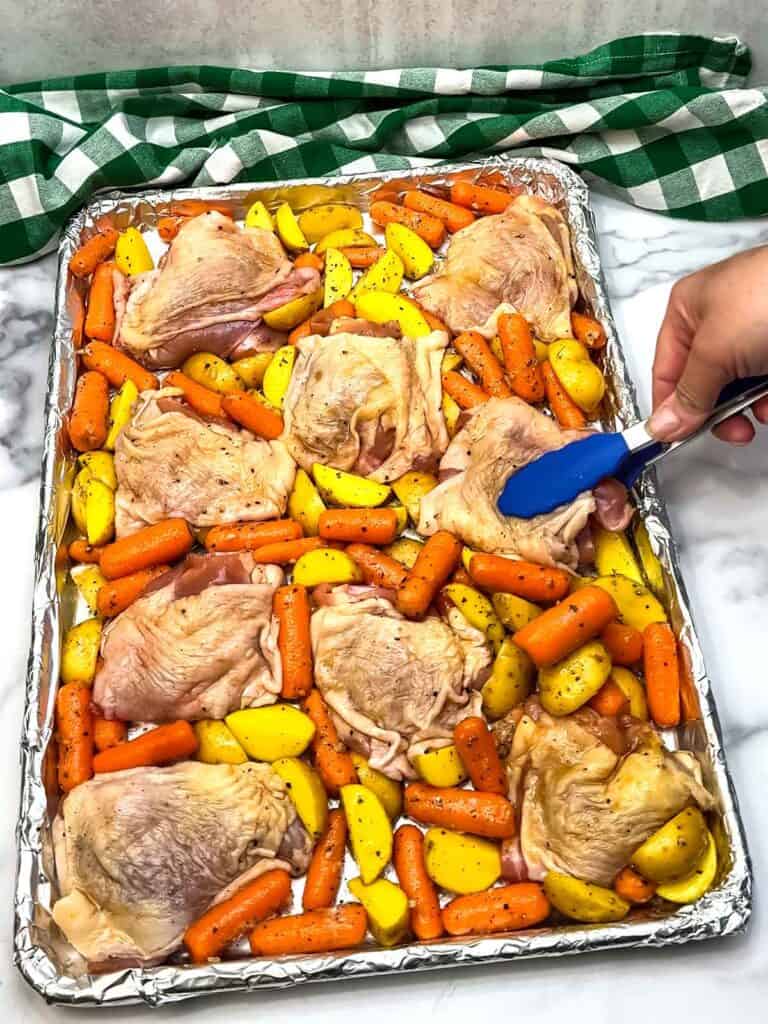 Simple Sheet Pan Ranch Chicken Thighs with Potatoes and Carrots - Pudge ...